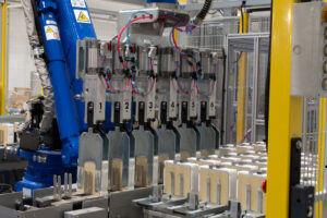 Cast-on-Strap machine (COS) for battery production