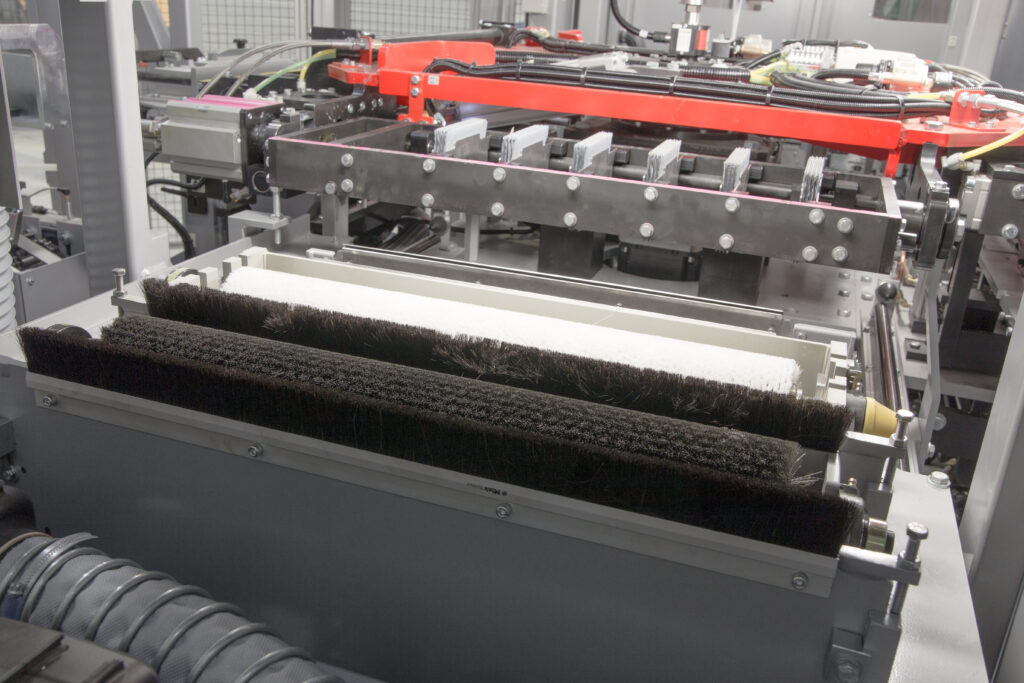 Cast-on-Strap machine (COS) for battery production