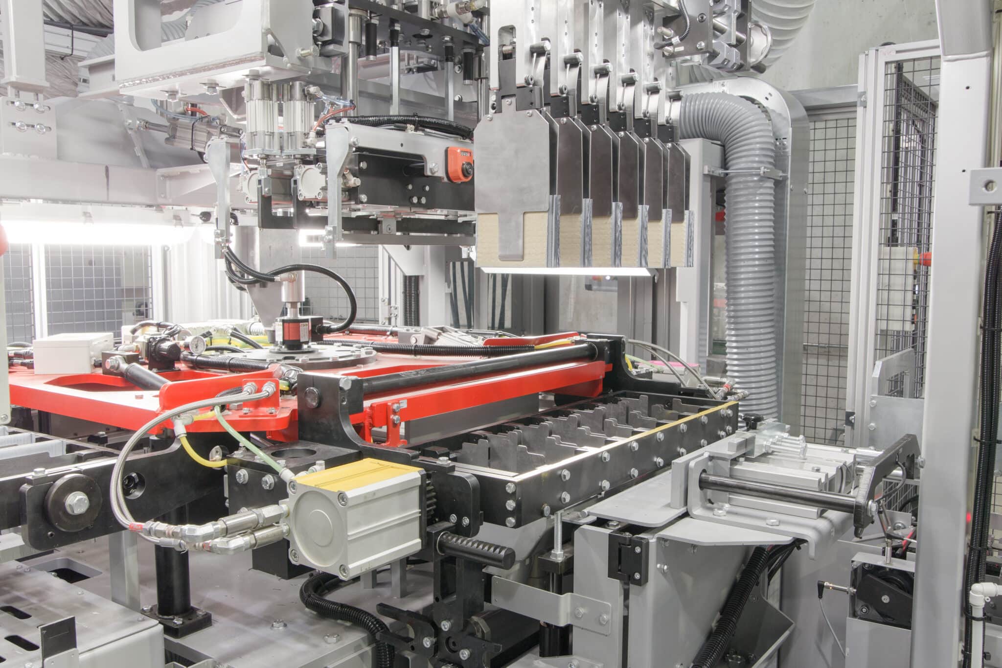 Cast-on-Strap machine (COS) for battery production