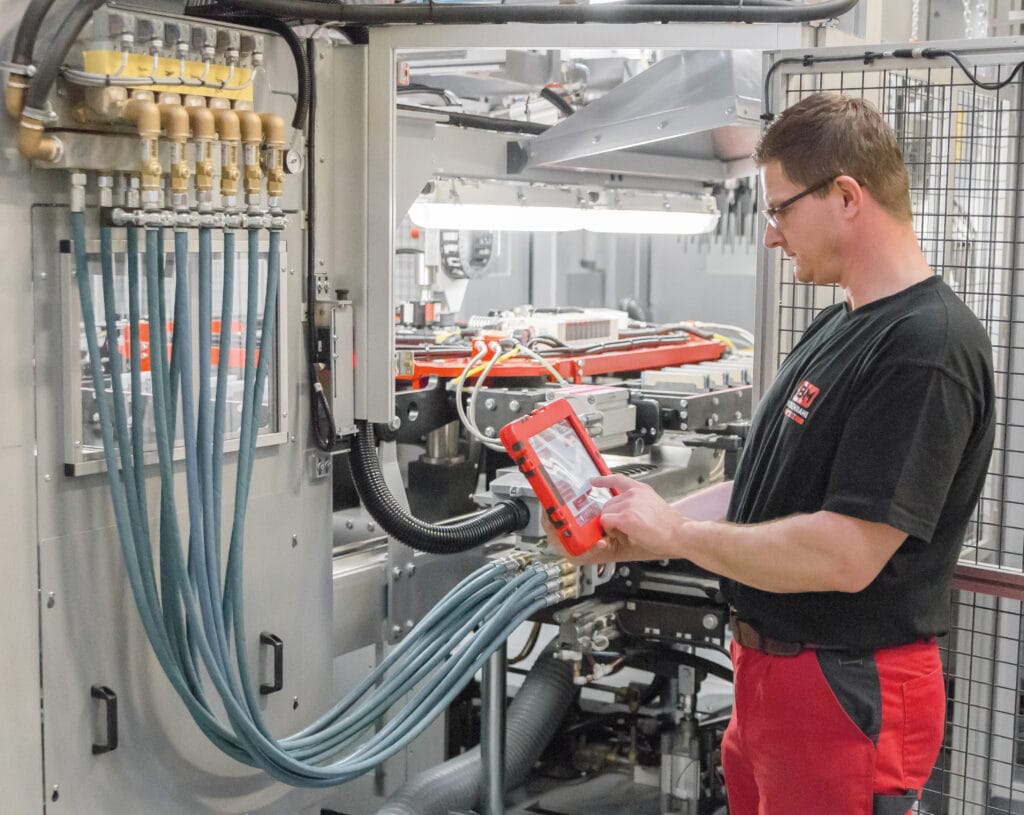 Cast-on-Strap machine (COS) for battery production